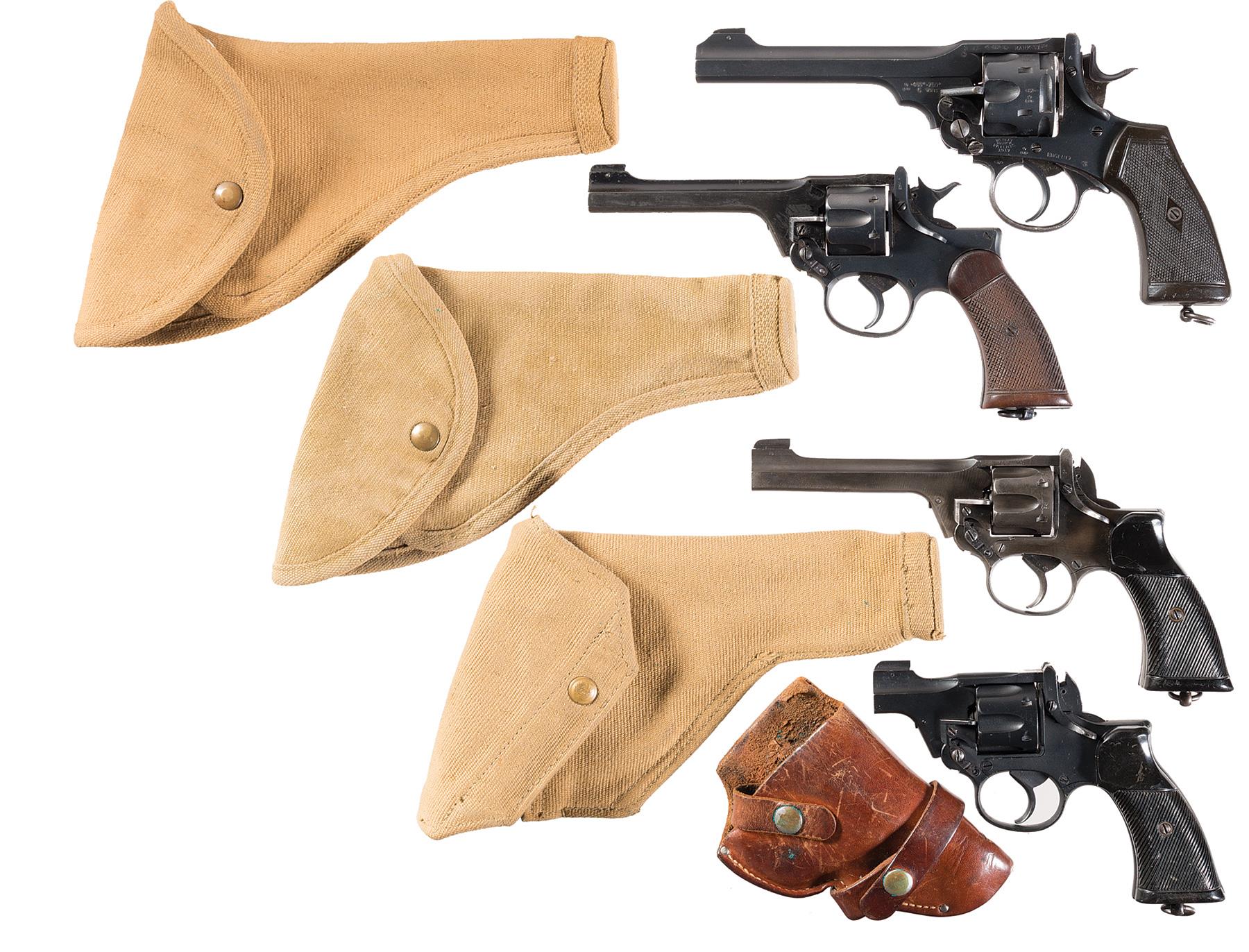 Four British Double Action Revolvers with Holsters | Rock Island Auction