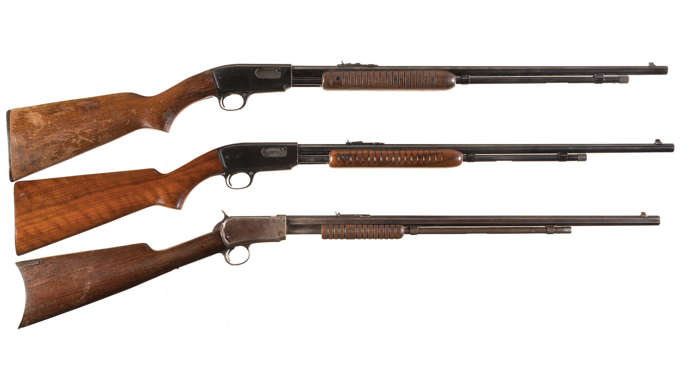 Three Winchester Slide Action Rifles | Rock Island Auction