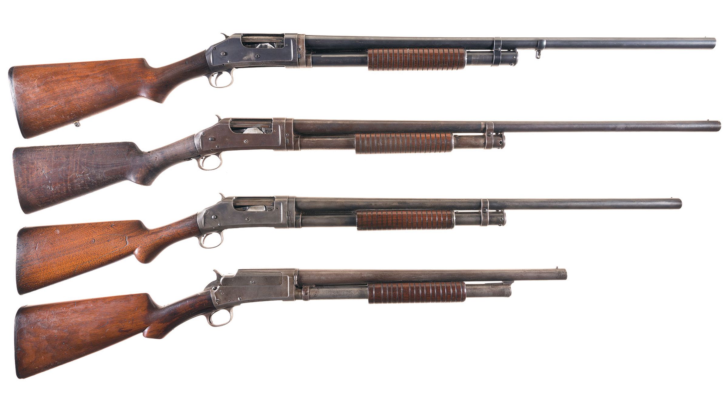 Four Slide Action Shotguns | Rock Island Auction