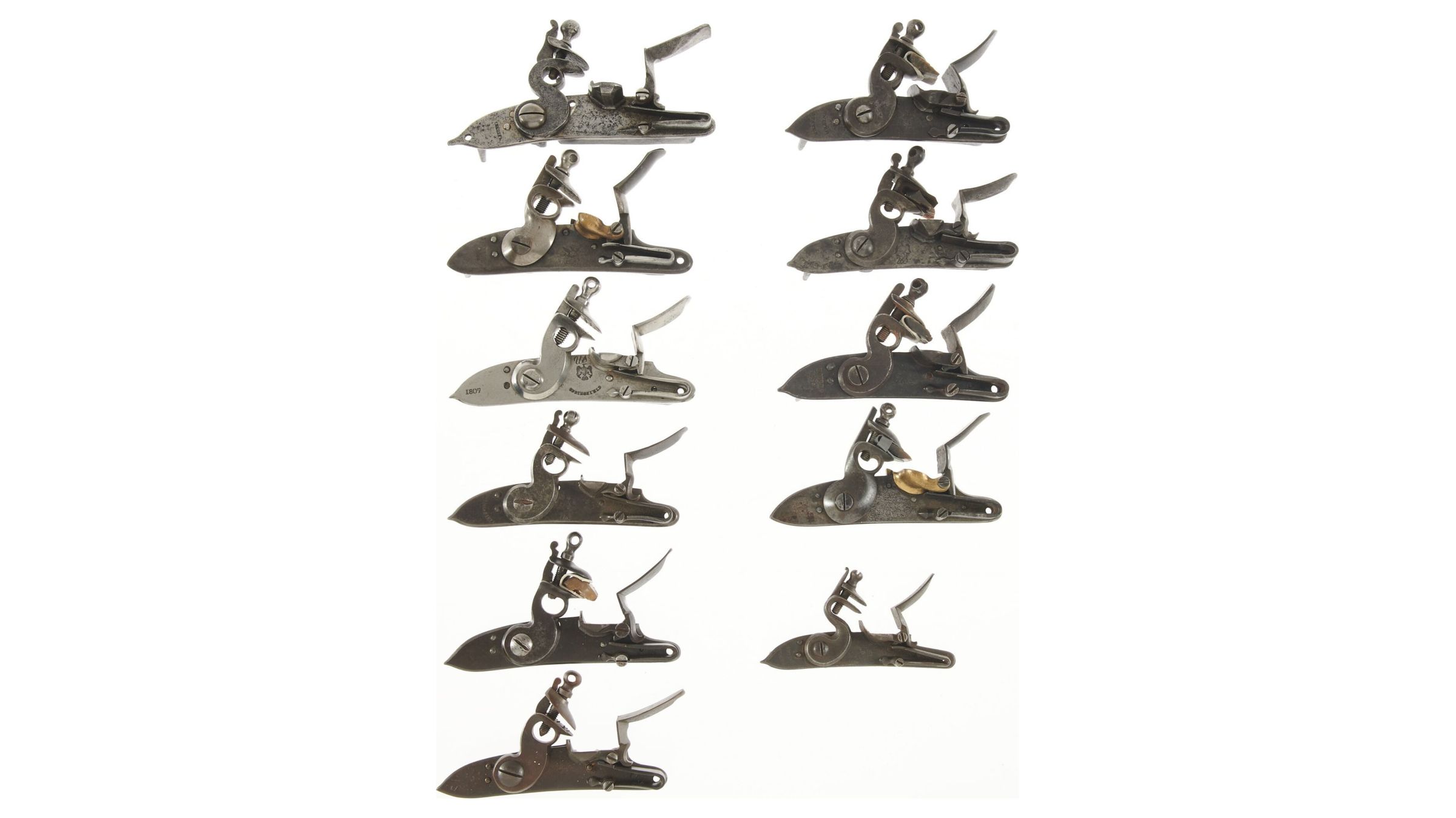 Eleven Early Martial Flintlock Lock Plates | Rock Island Auction