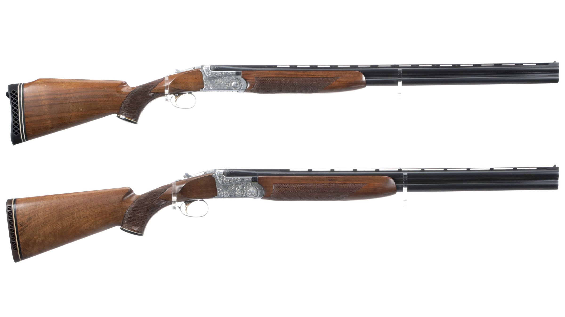 Two Factory Engraved SKB Model 700 Over/Under Shotguns | Rock Island ...
