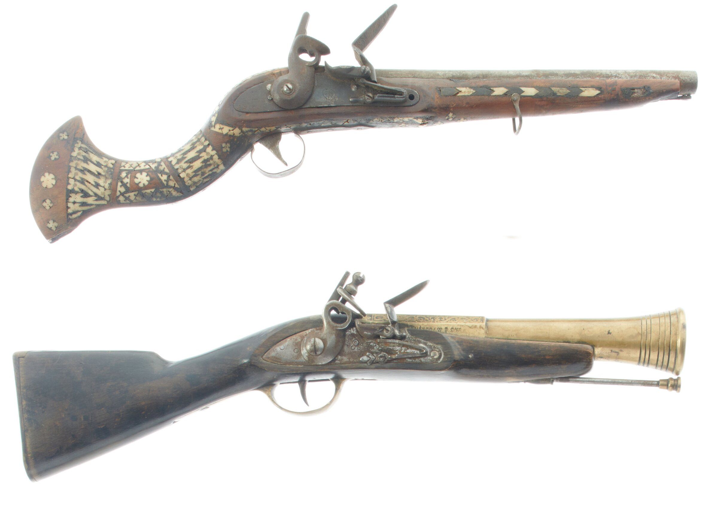 Two Flintlock Pistols and Three Daggers | Rock Island Auction