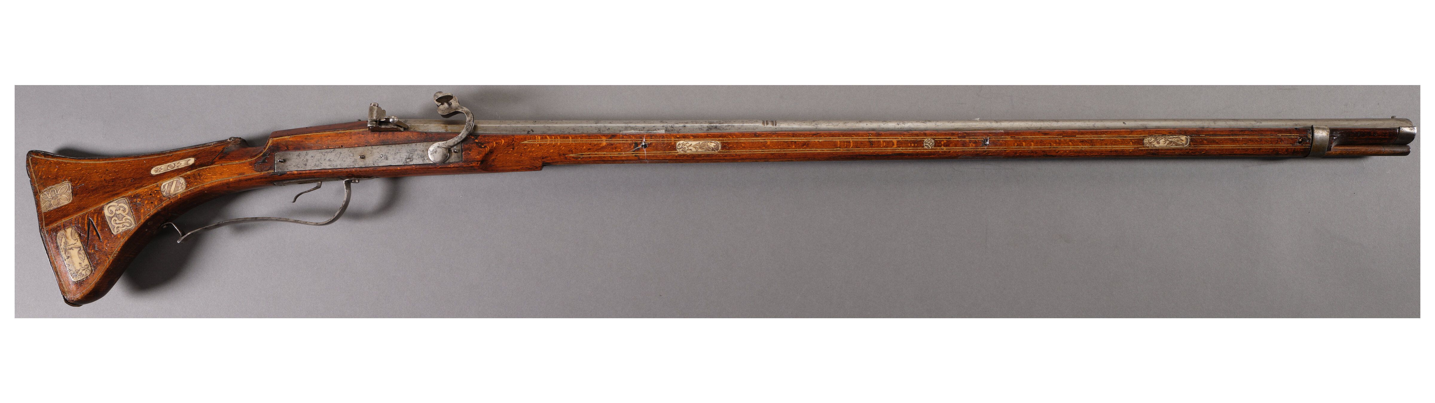 Inlaid German "Fishtail" Matchlock Musket with Sword | Rock Island Auction