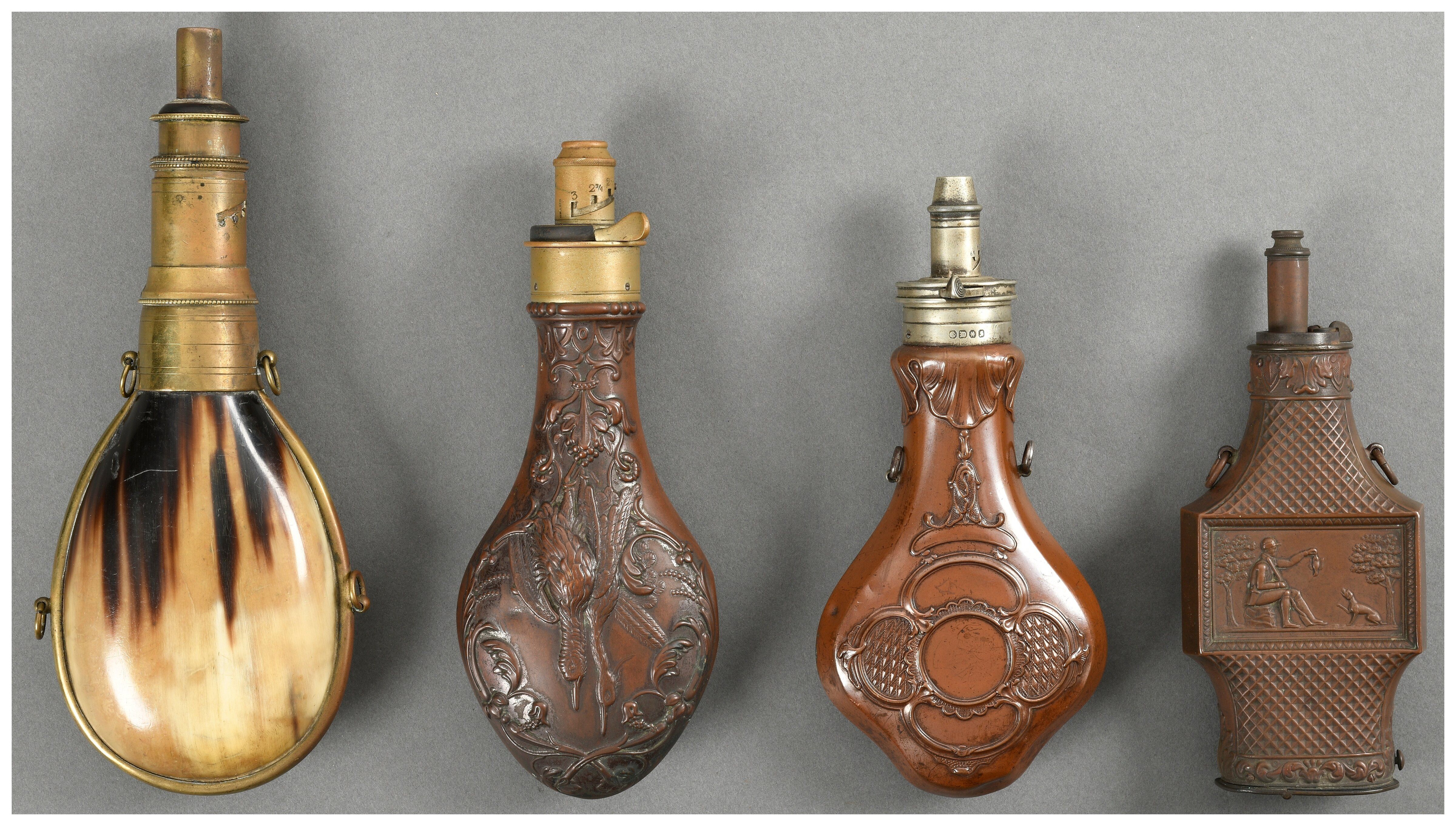 Four Powder Flasks | Rock Island Auction