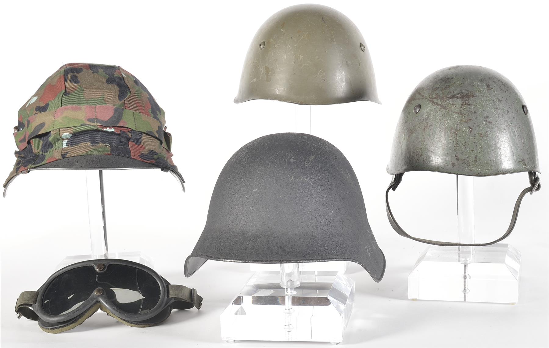 Four European Style Military Helmets | Rock Island Auction