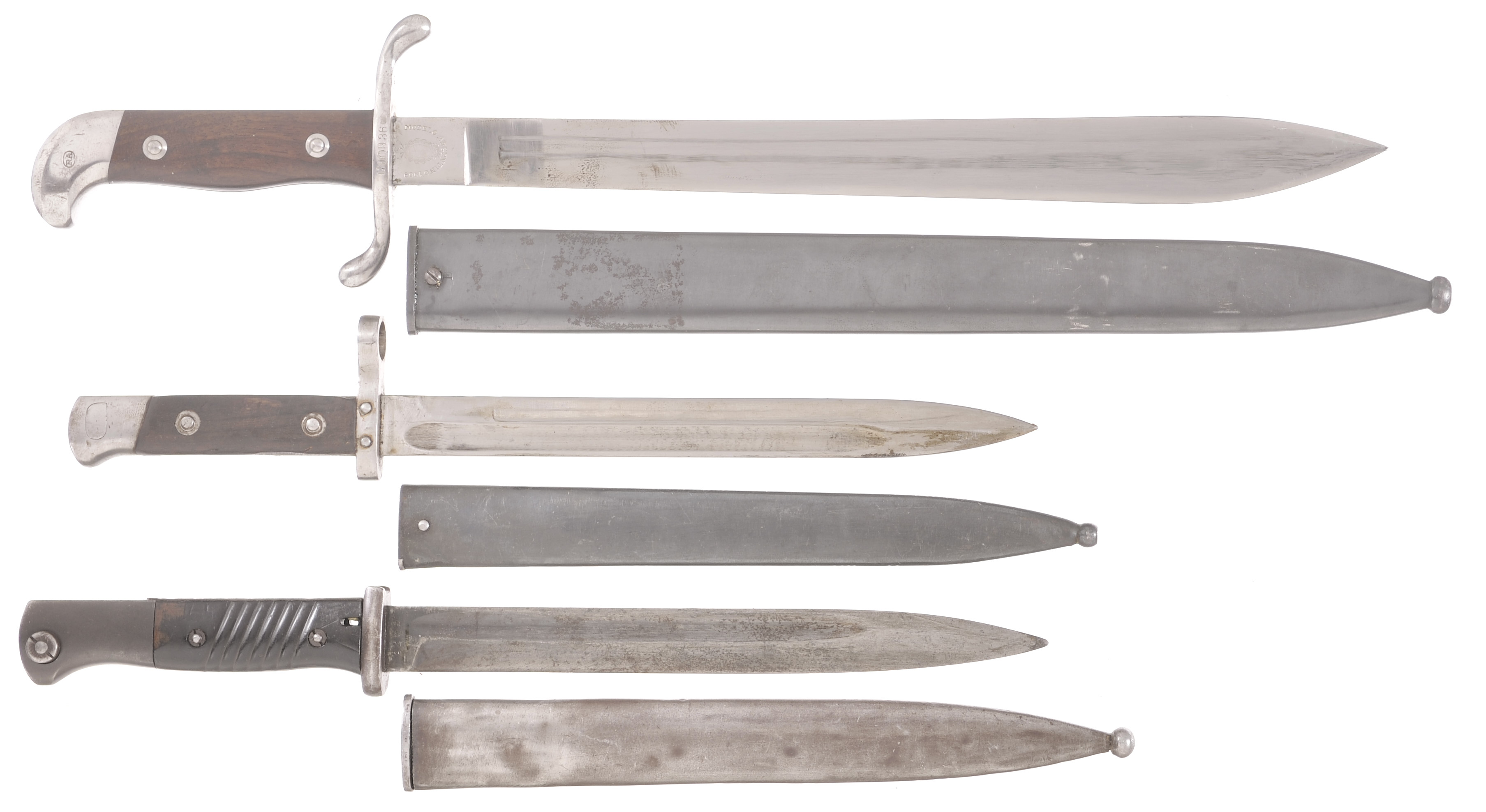 Group Of Three Assorted Edged Weapons Rock Island Auction group-of-three-assorted-edged-weapons-rock-island-auction