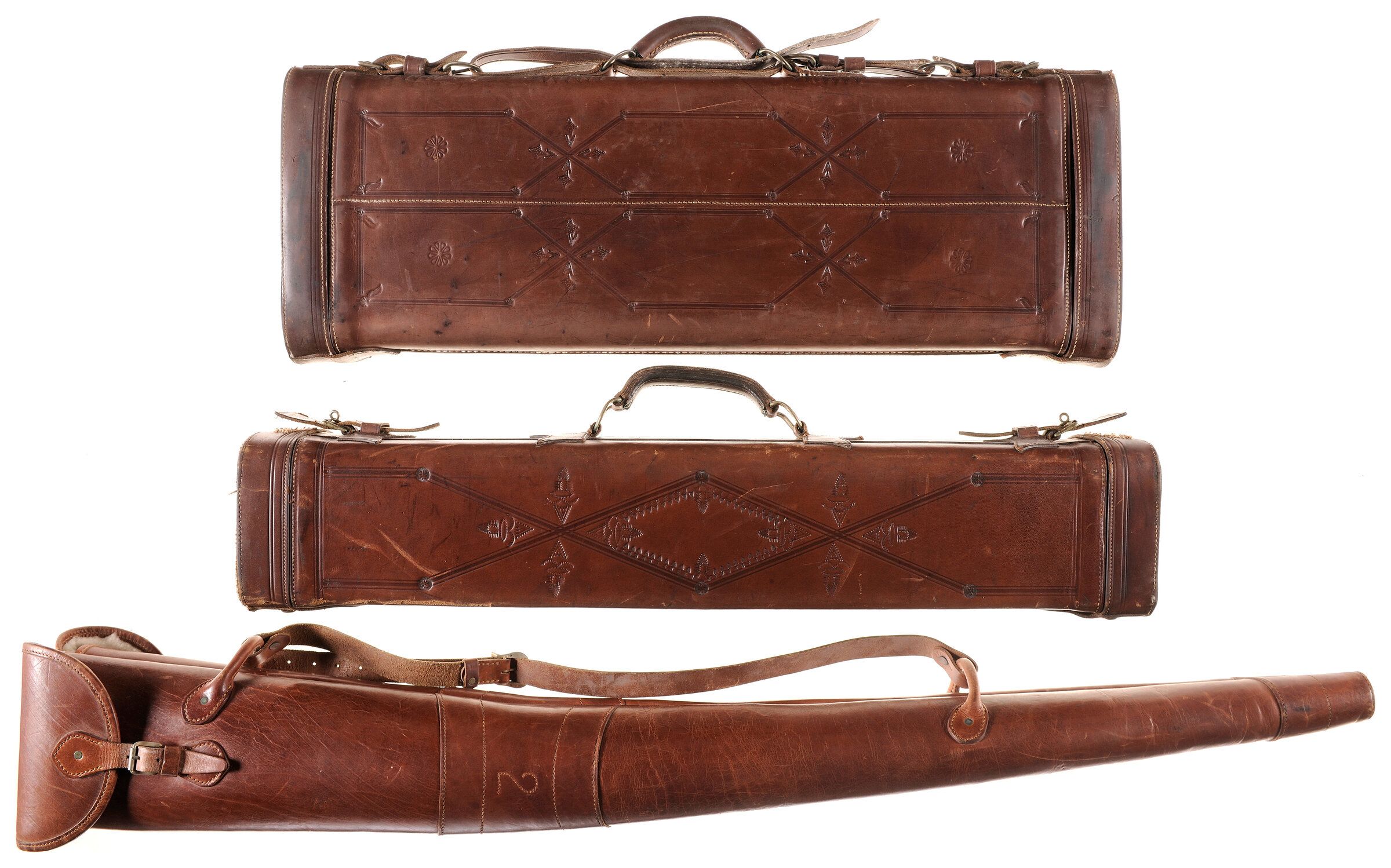 Group of Three Leather Carry Cases | Rock Island Auction