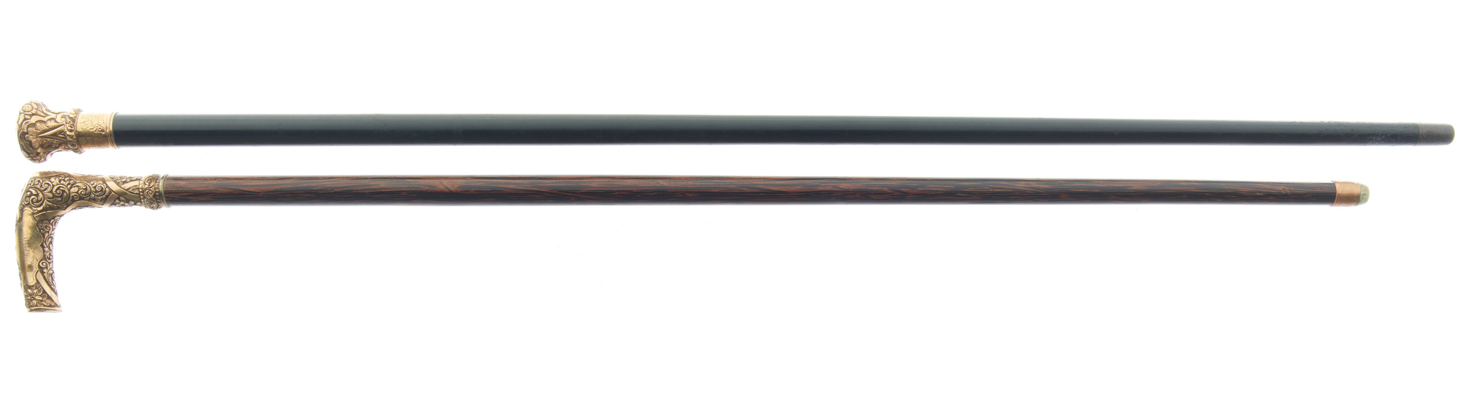 Two Canes with Inscribed and Relief Engraved Gilt Brass Handles | Rock ...