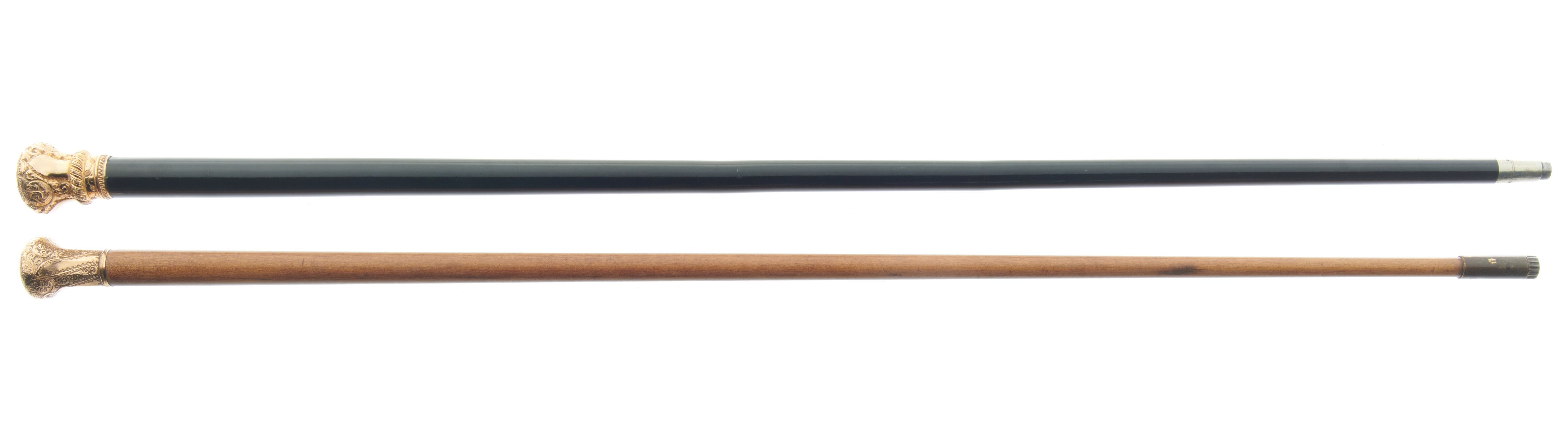 Two Canes with Inscribed, Engraved, and Gilt Grips | Rock Island Auction