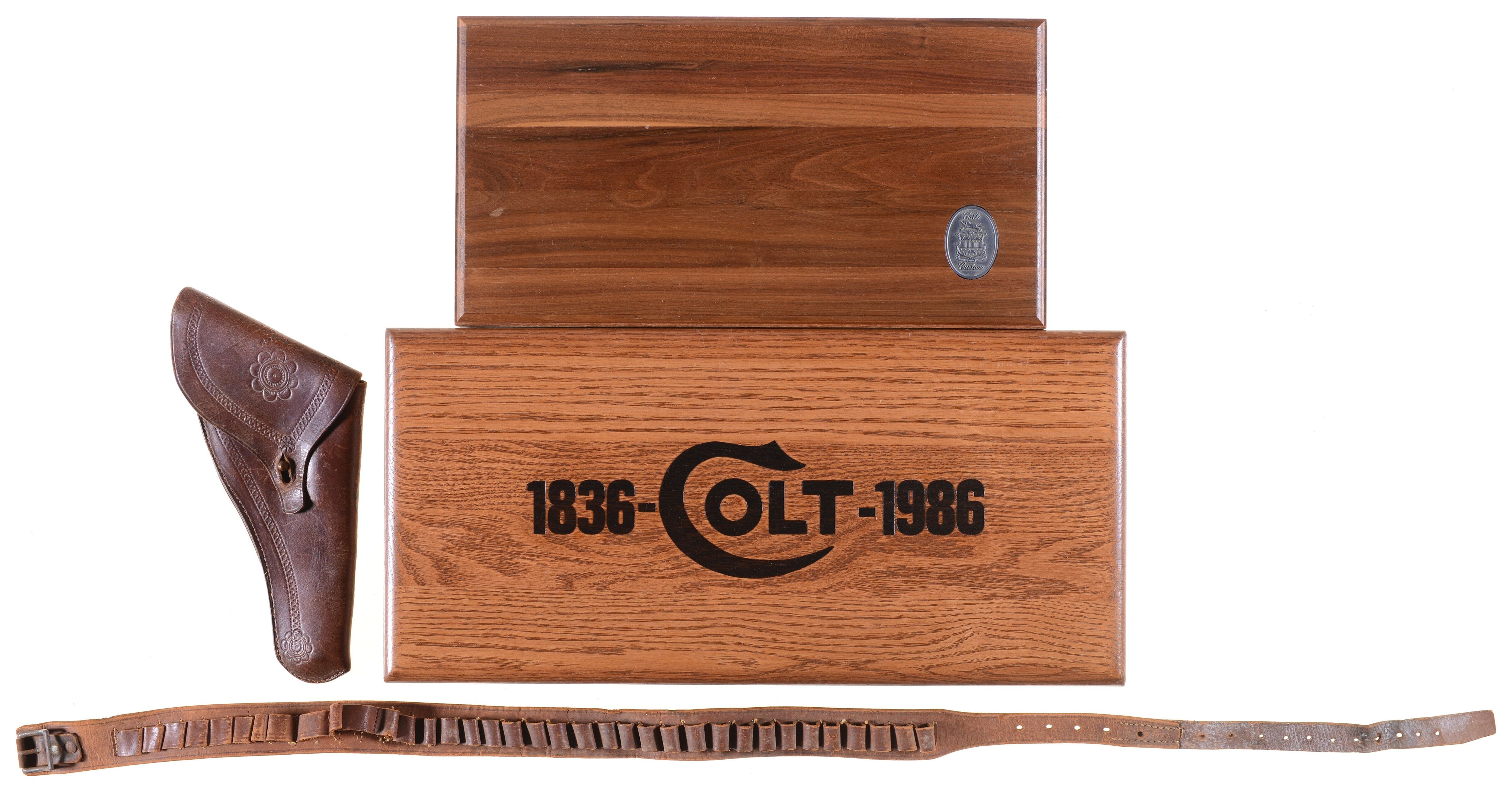 Two Colt Display Cases and a Holster | Rock Island Auction