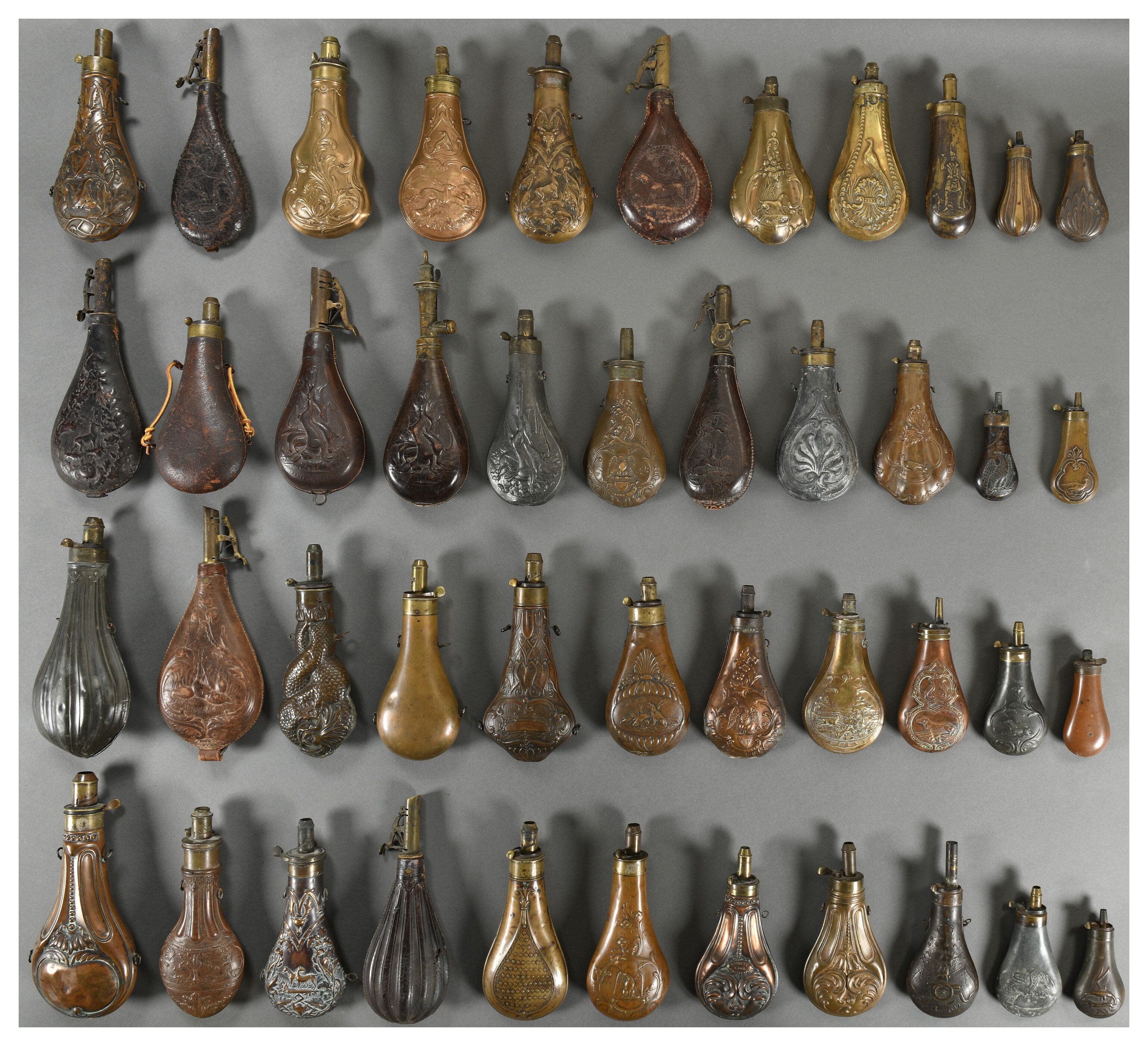 Large Group of Powder Flasks | Rock Island Auction