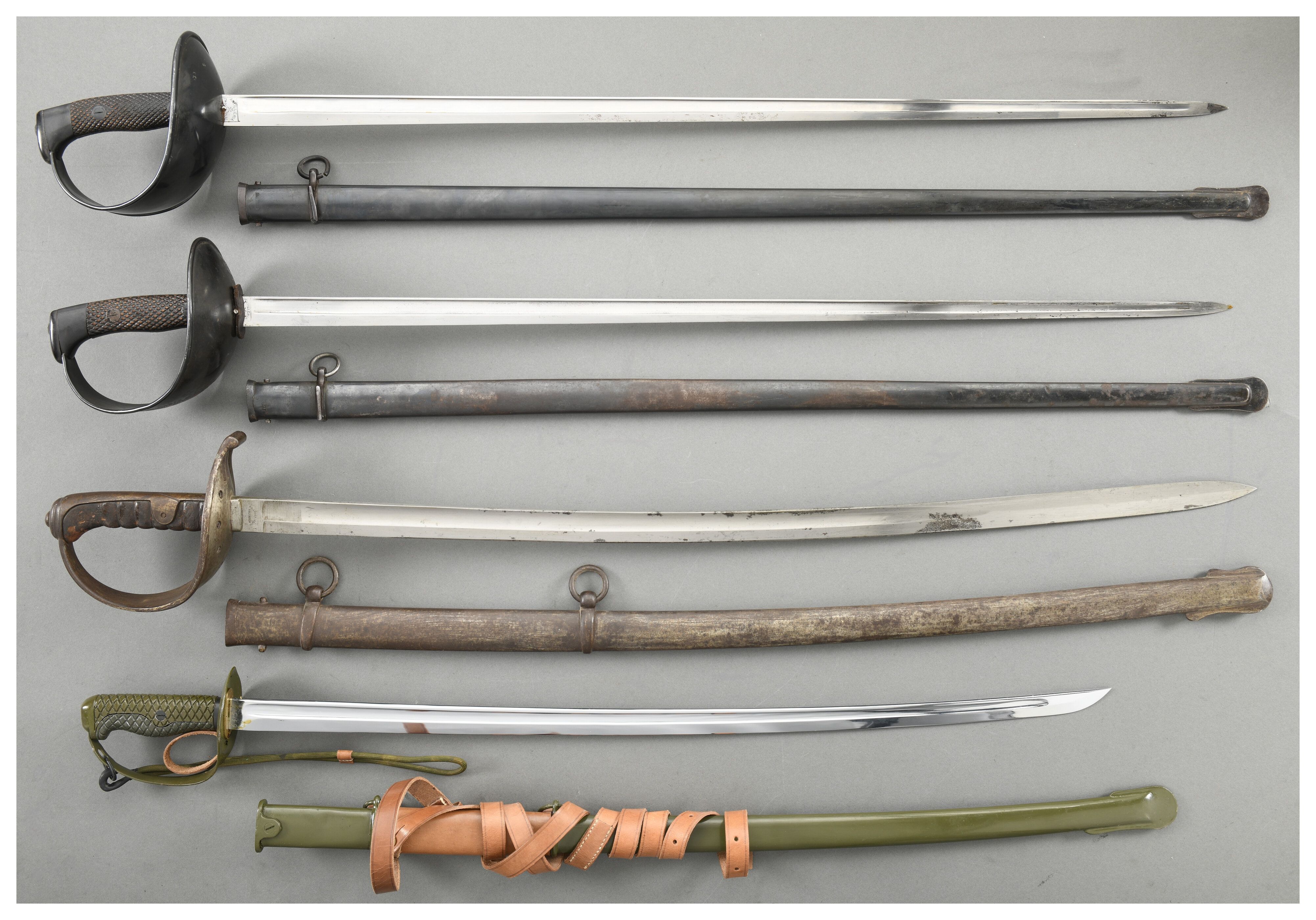 Four Military Pattern Cavalry Swords with Scabbards | Rock Island Auction