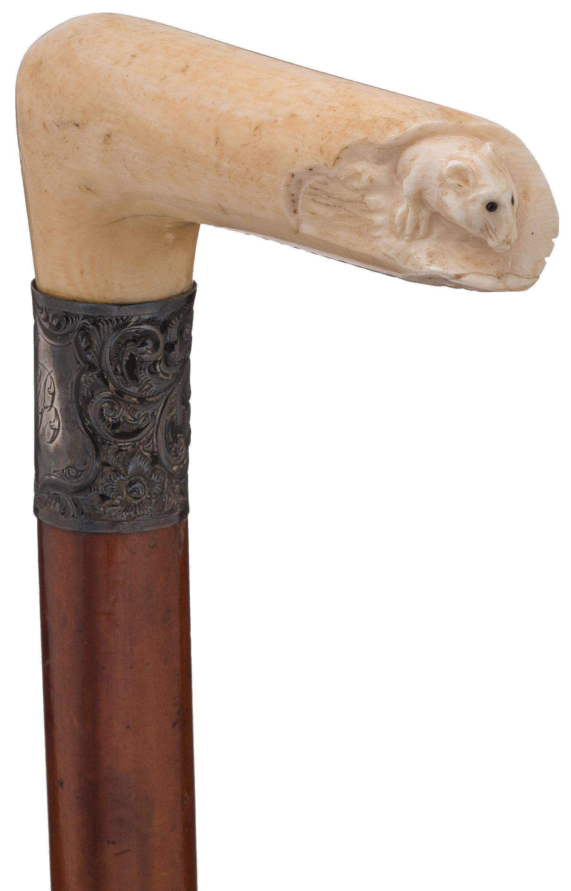 Relief Carved Mouse in a Log Cane with Silver Band | Rock Island Auction