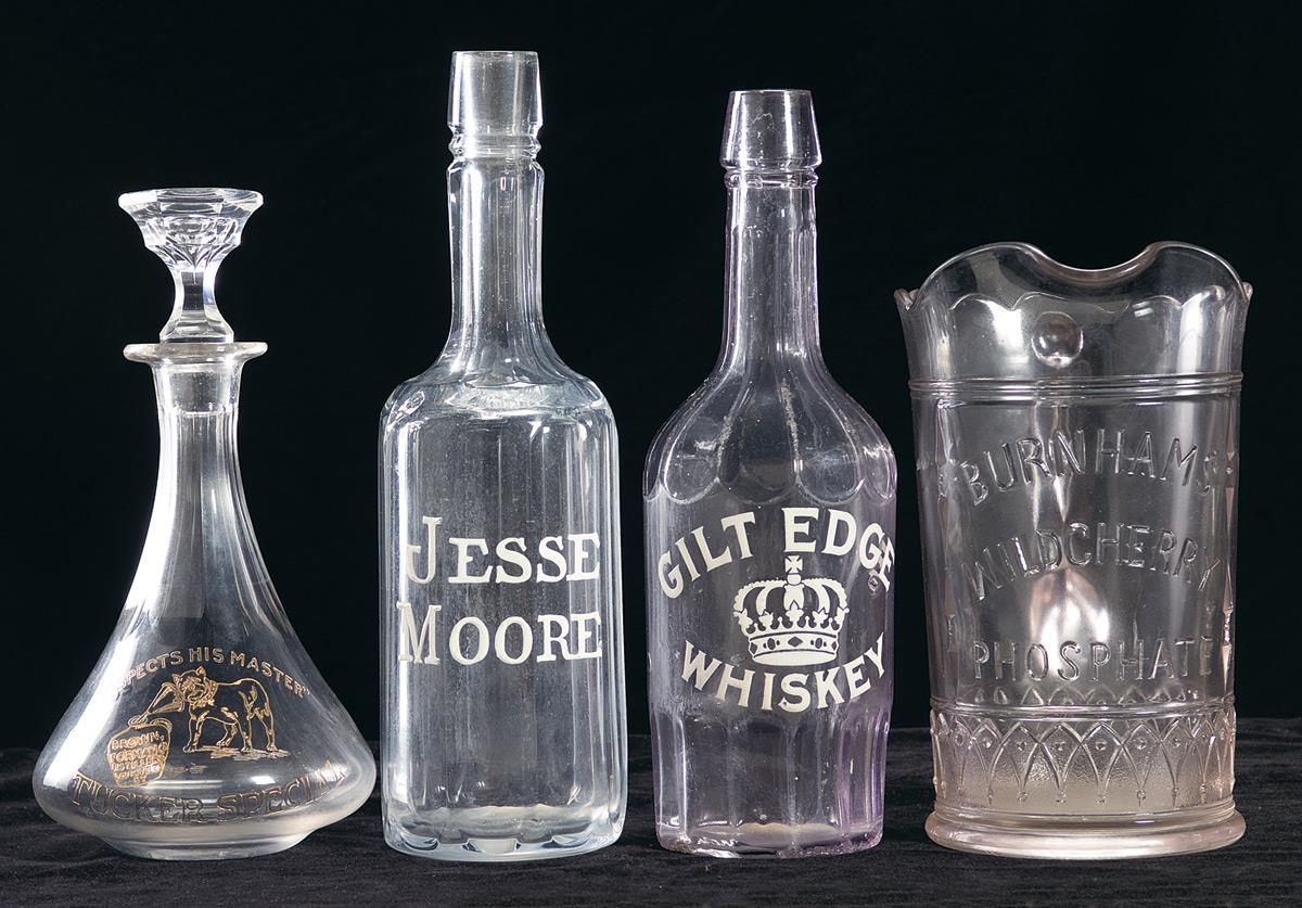 Four Rare Assorted Glass Back Bar Bottles | Rock Island Auction