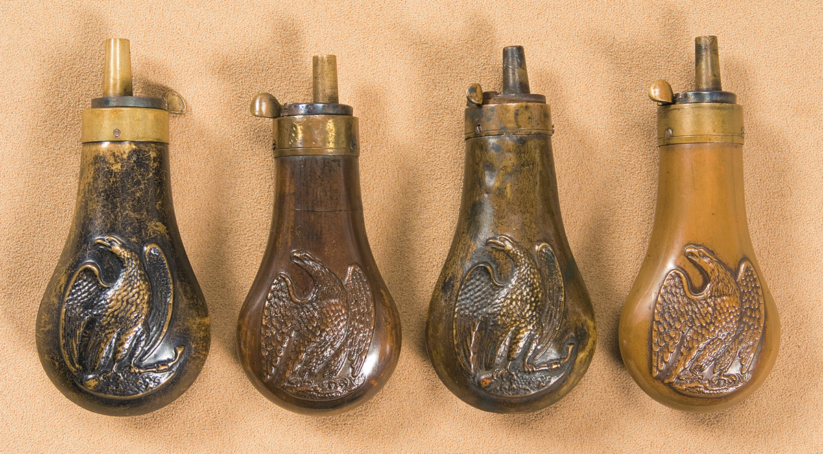 Four Eagle Powder Flasks | Rock Island Auction