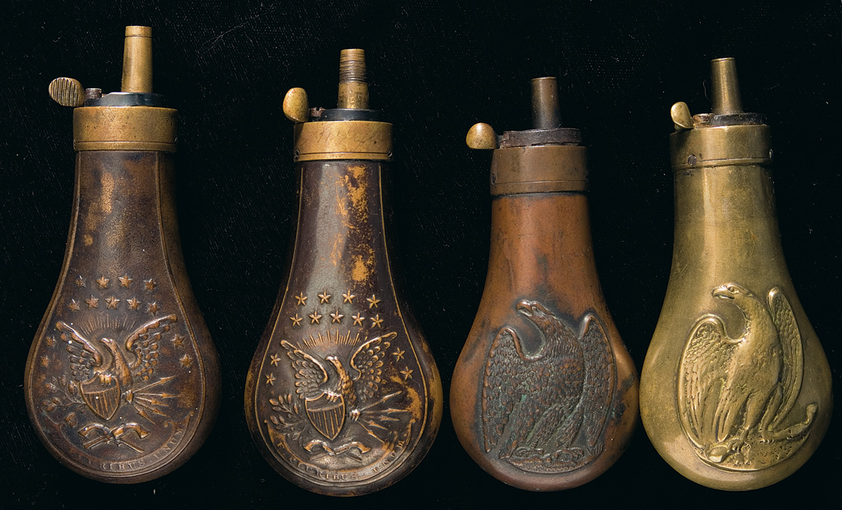 Four Eagle Powder Flasks | Rock Island Auction