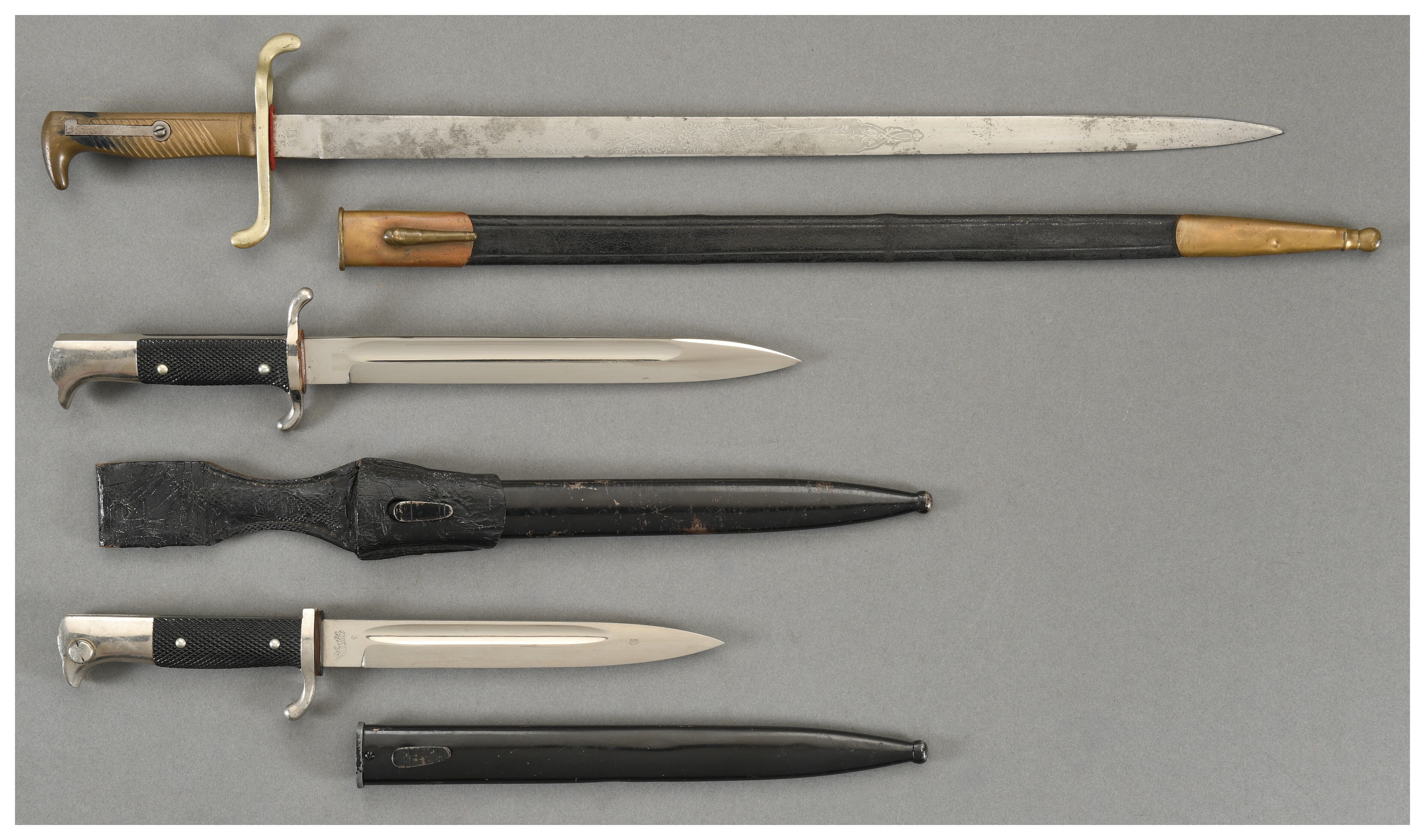 Three Edged Weapons with Scabbards | Rock Island Auction