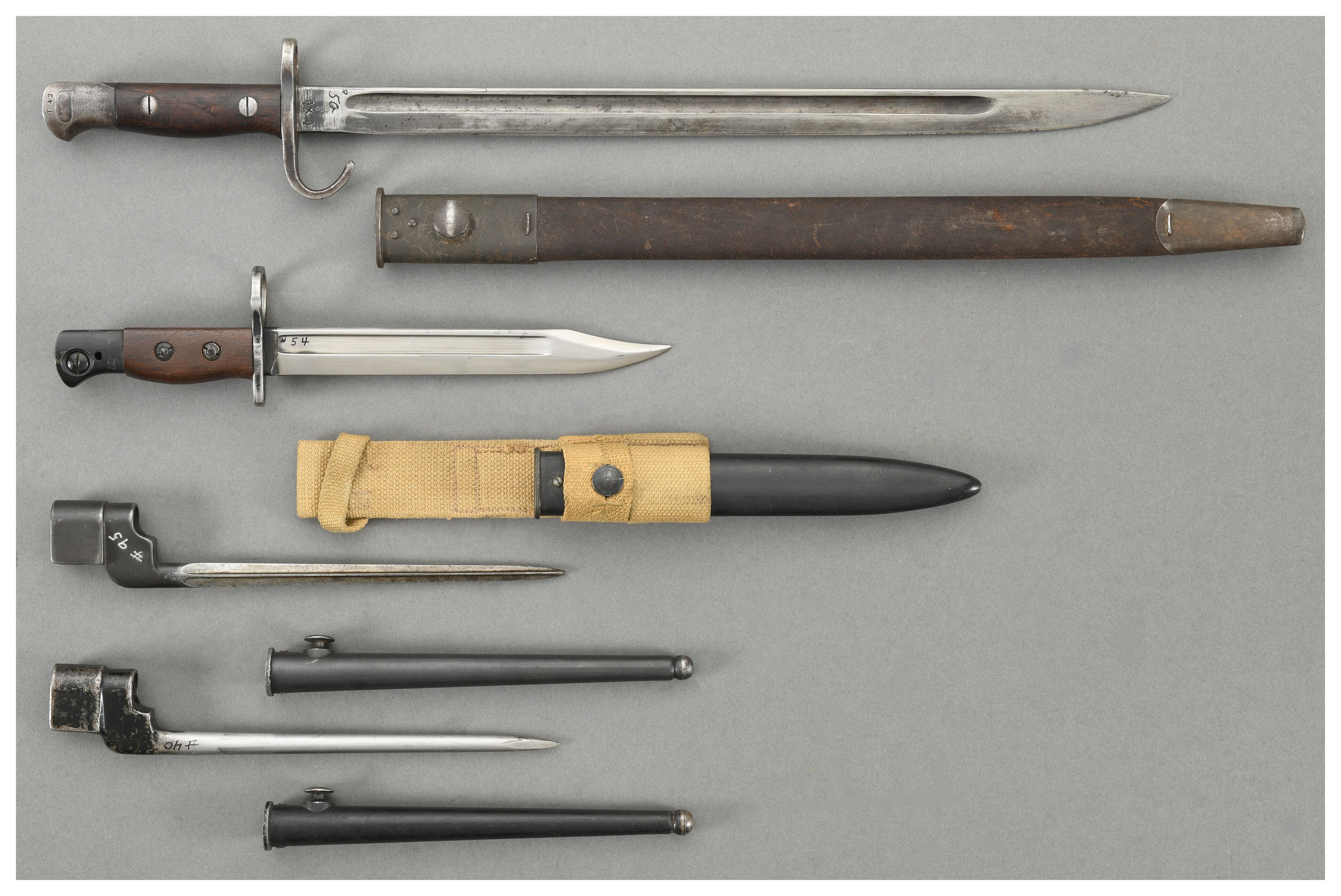Four British Bayonets with Sheaths | Rock Island Auction