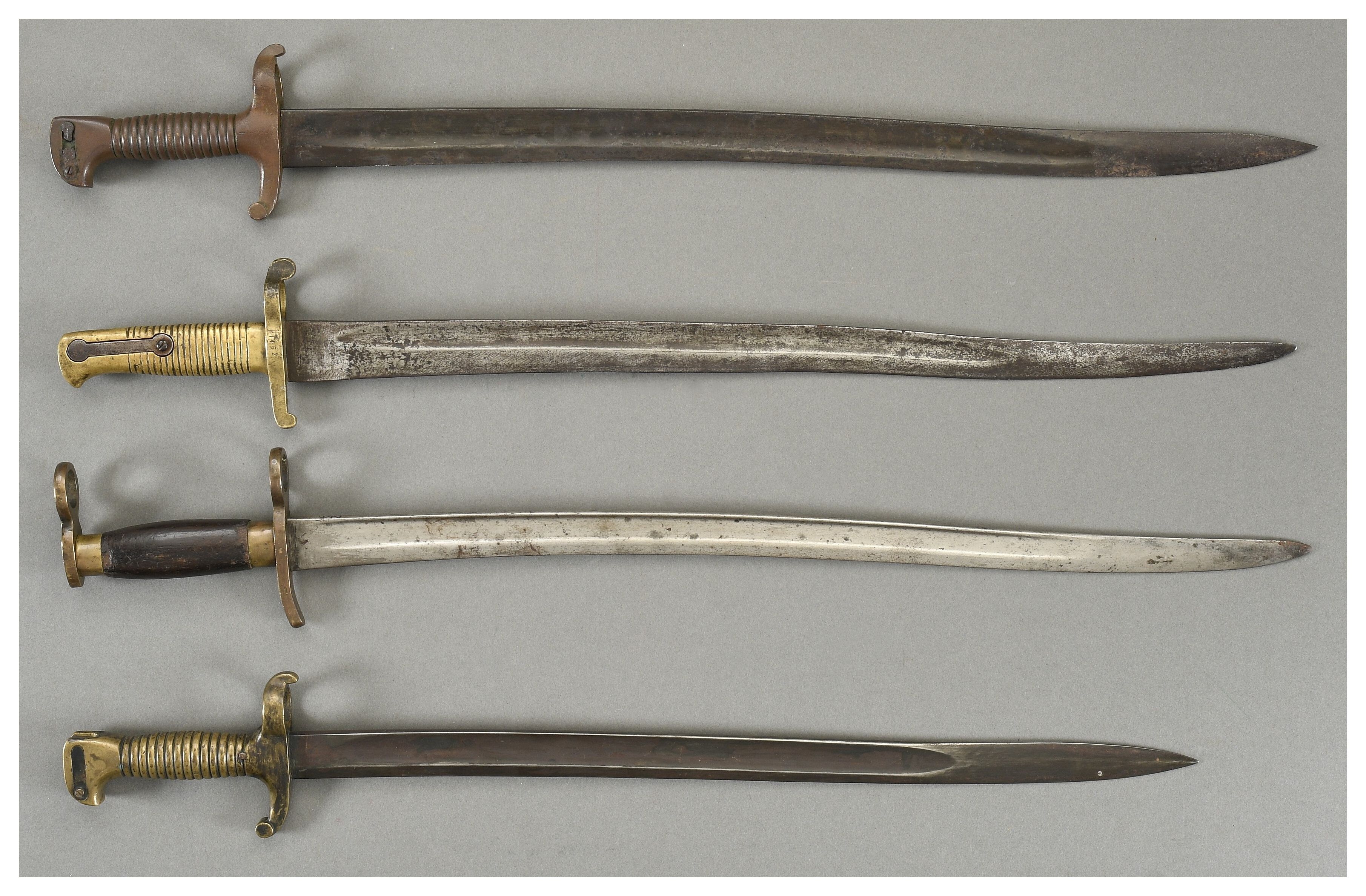 Four Saber Bayonets | Rock Island Auction