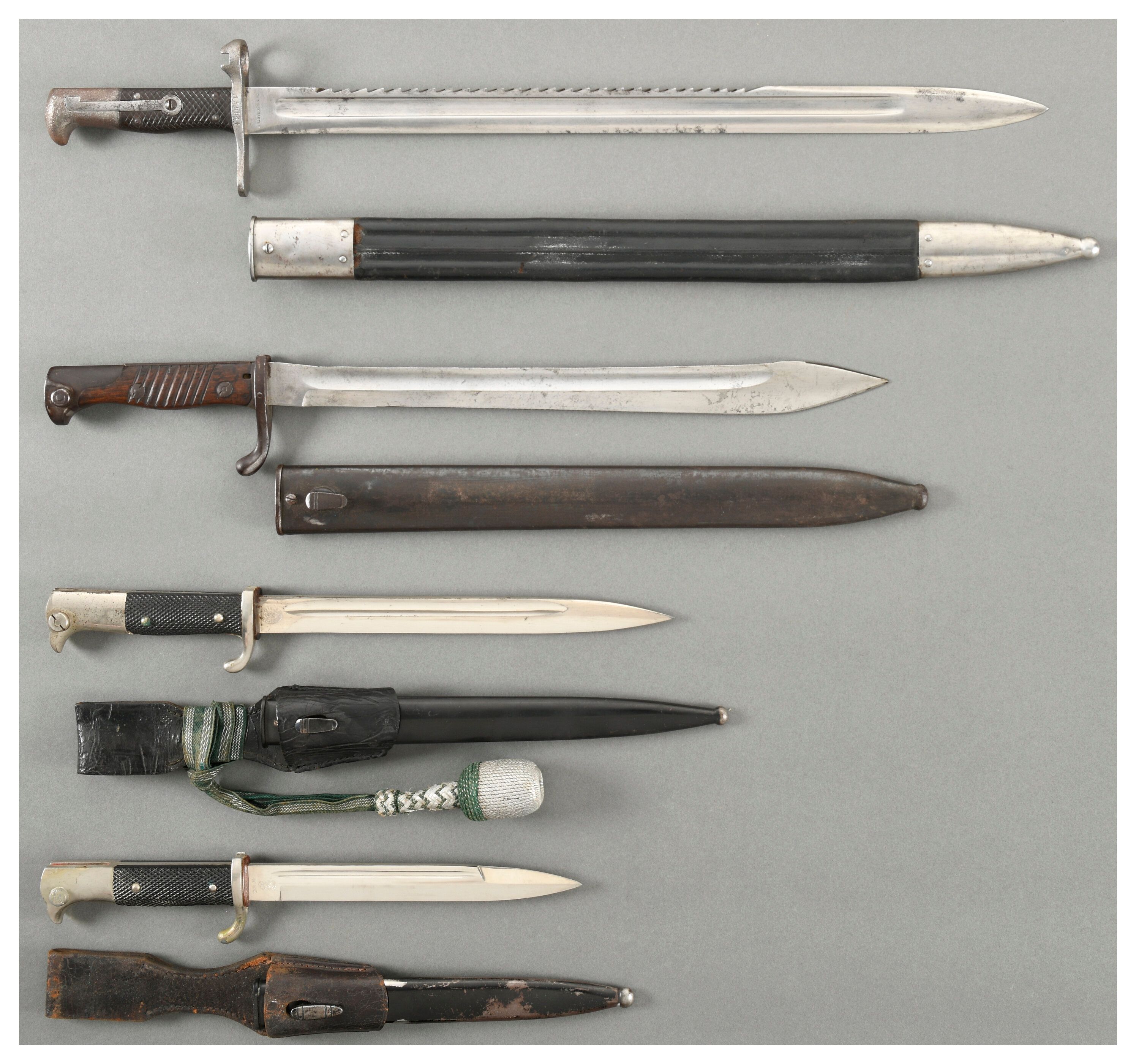 Four European Military Bayonets with Scabbards | Rock Island Auction