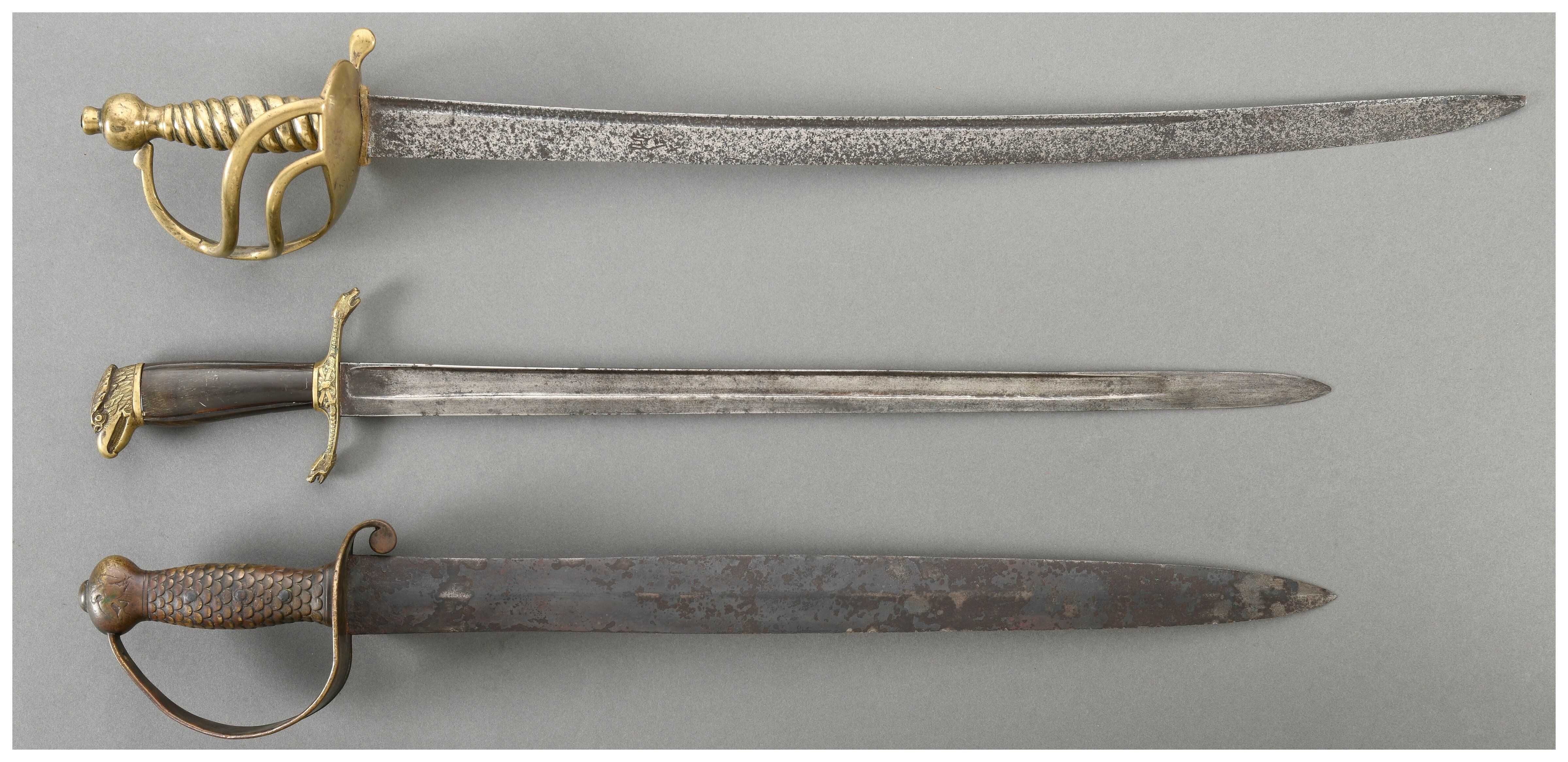 Three Short Swords | Rock Island Auction