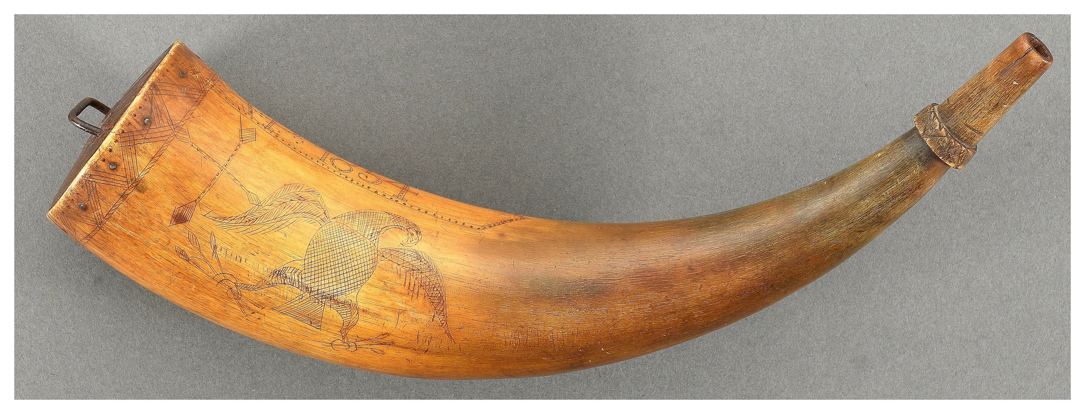 A Carved Powder Horn | Rock Island Auction