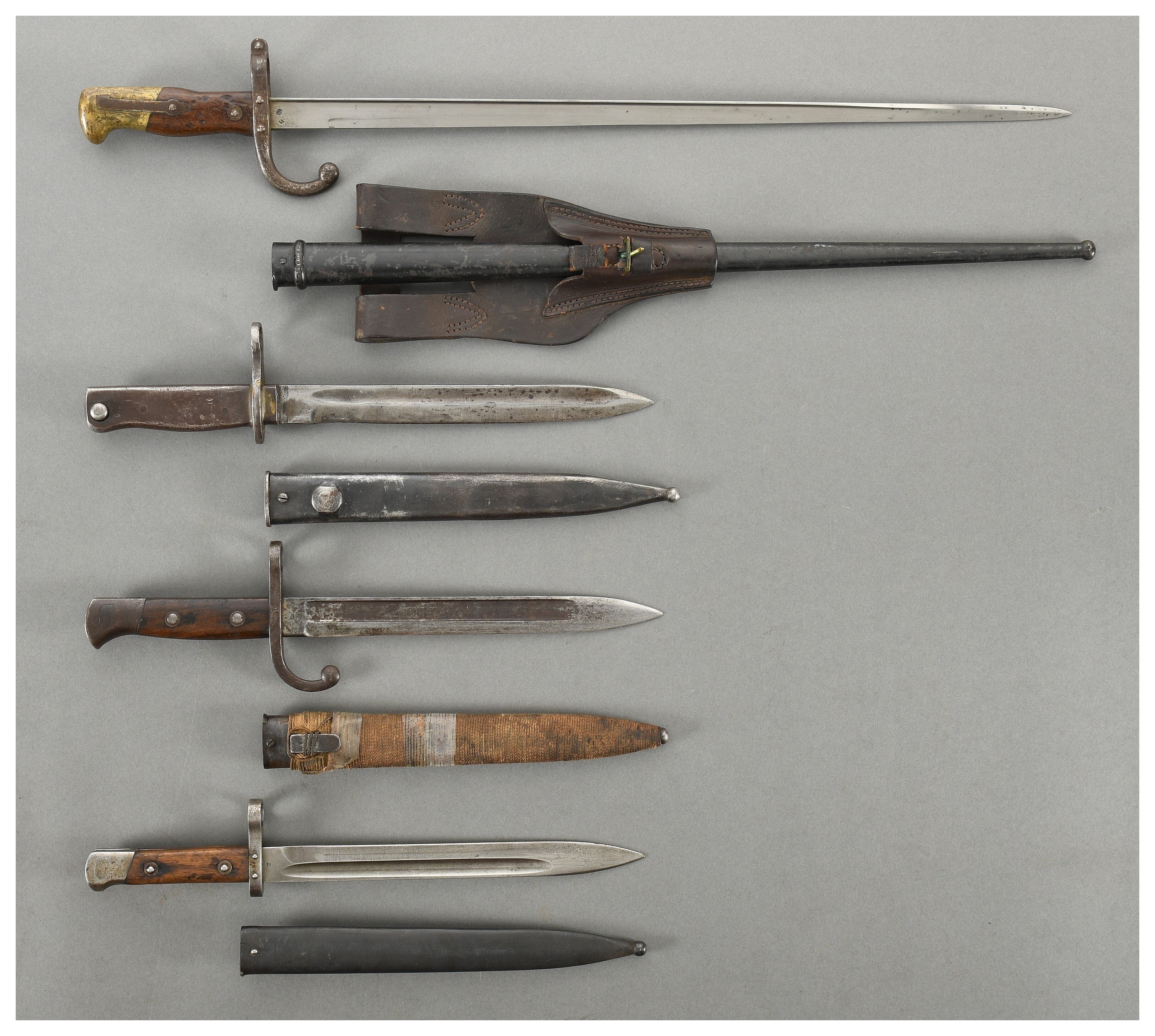 Four Bayonets with Sheaths | Rock Island Auction