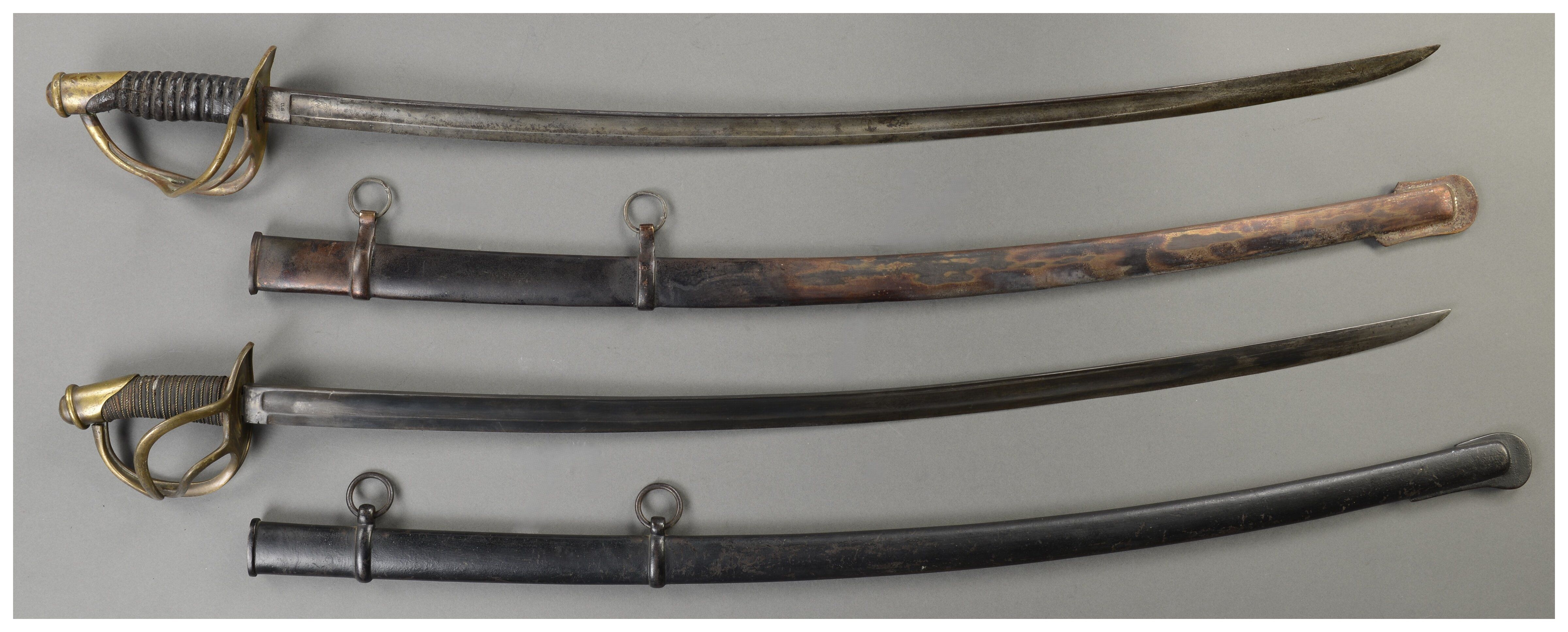 Two U.S. Cavalry Swords with Scabbards | Rock Island Auction