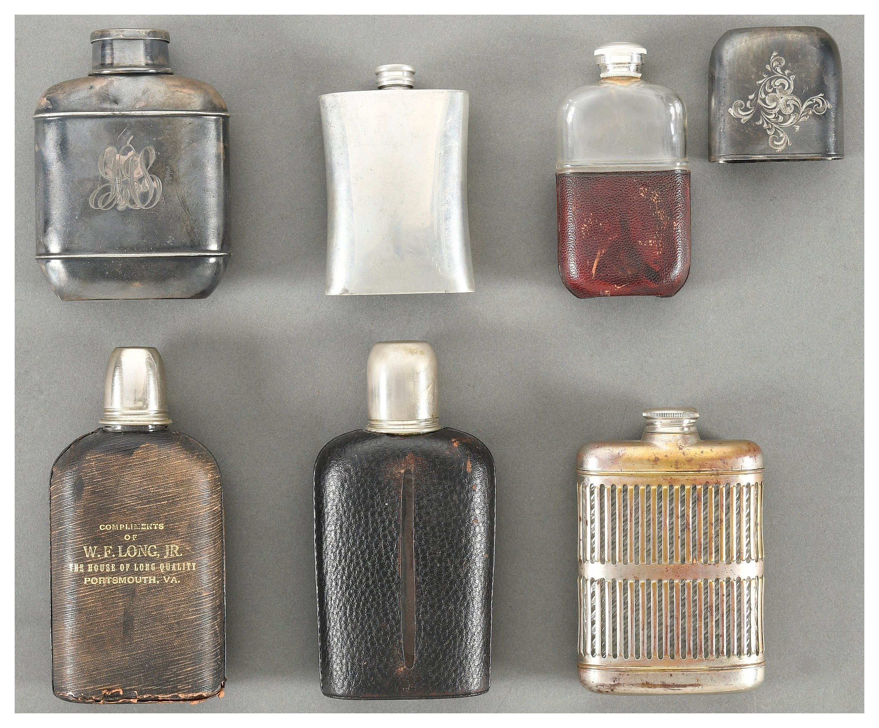 Grouping of Six Drinking Flasks | Rock Island Auction