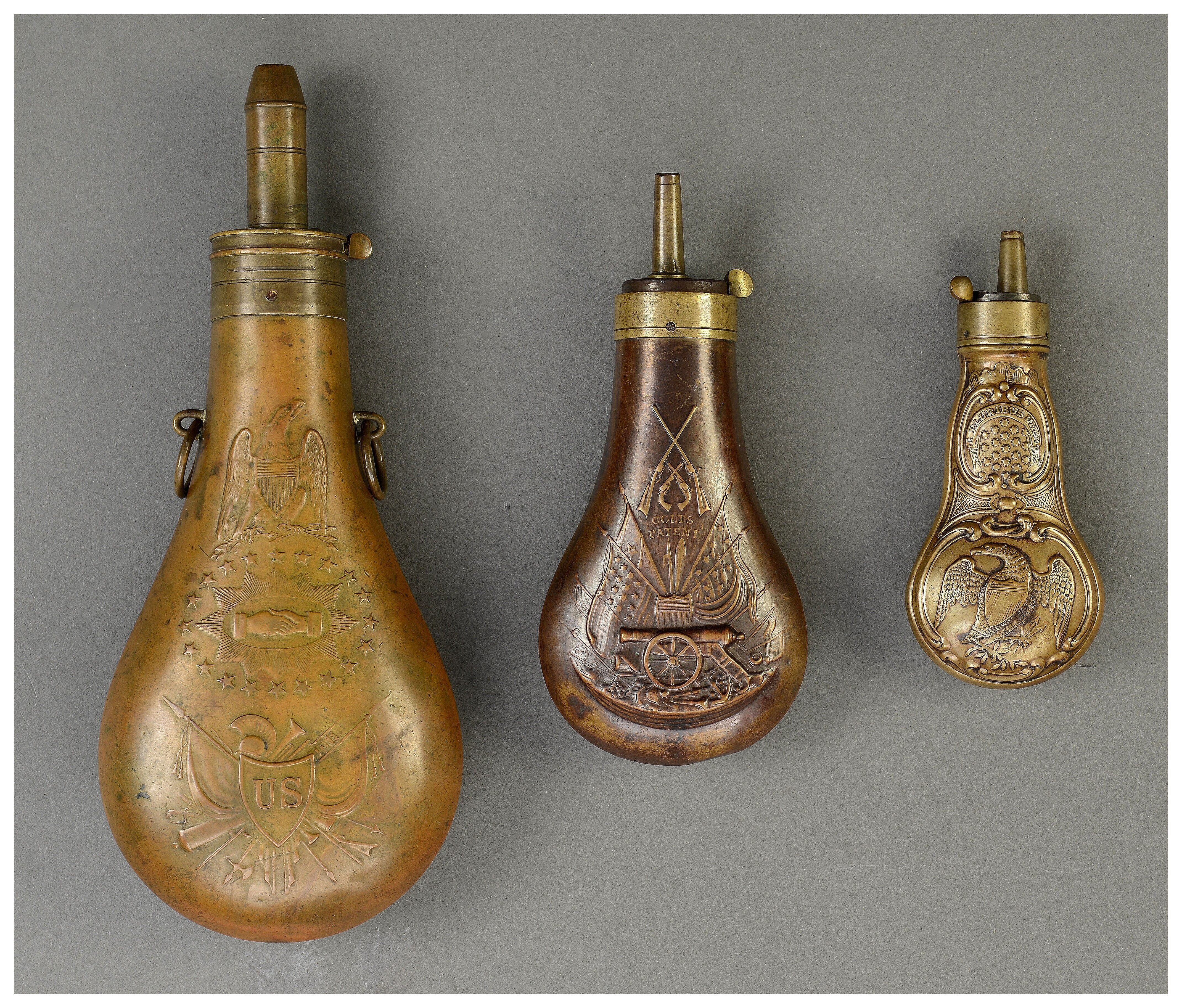 Three Powder Flasks | Rock Island Auction
