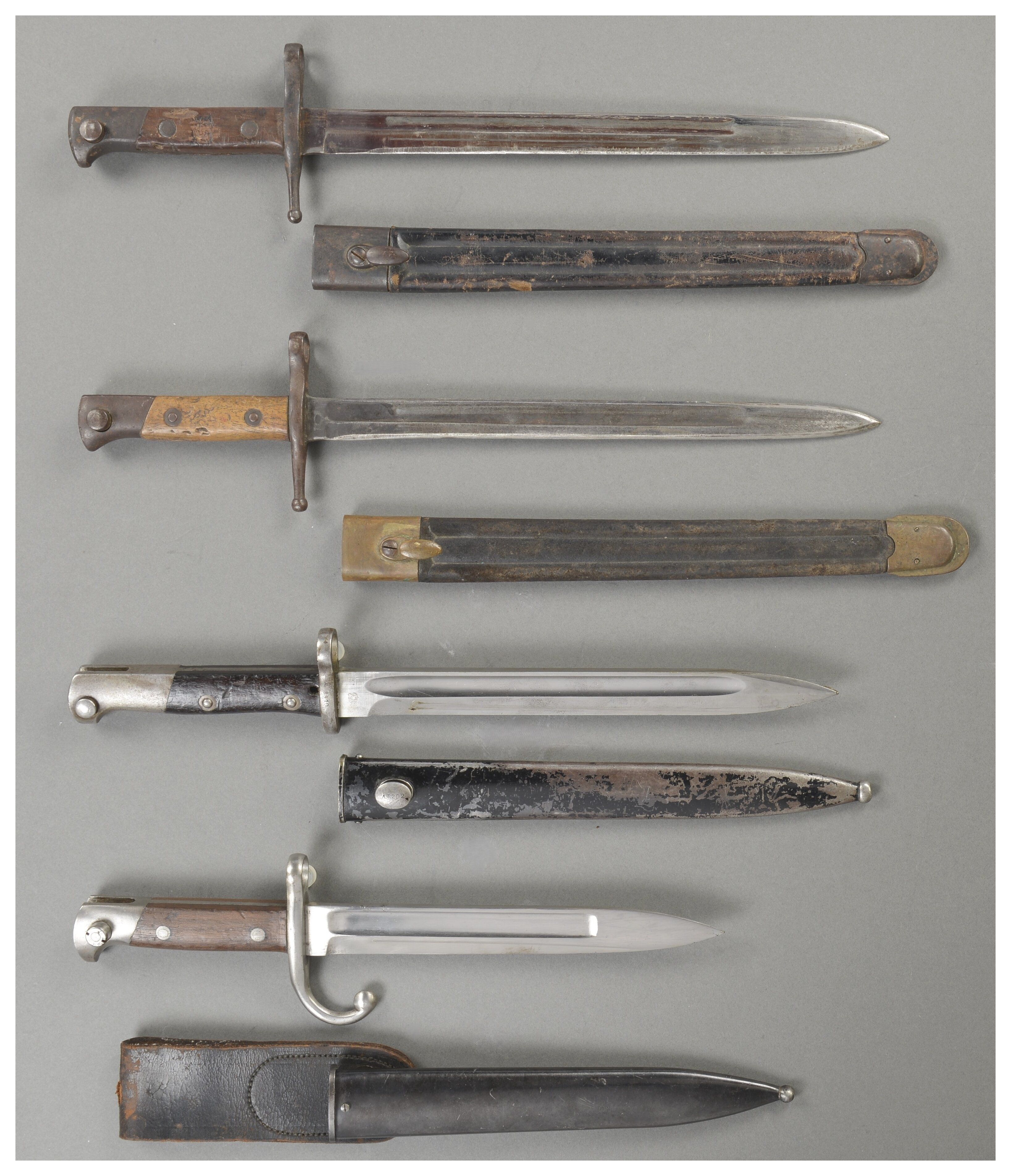 Four Military Pattern Bayonets with Scabbards | Rock Island Auction