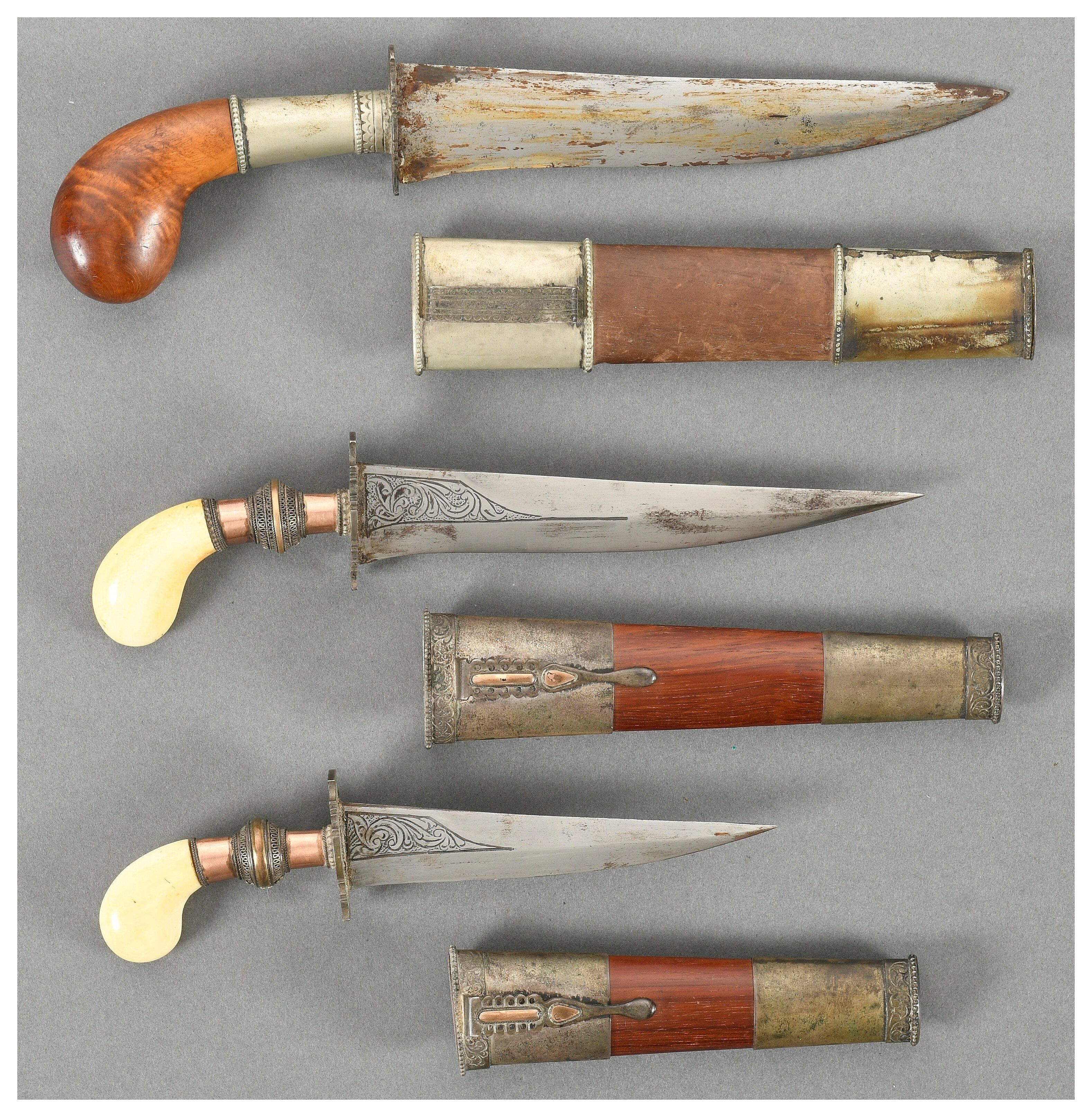 Three Daggers with Scabbards and a Faux Book Case | Rock Island Auction