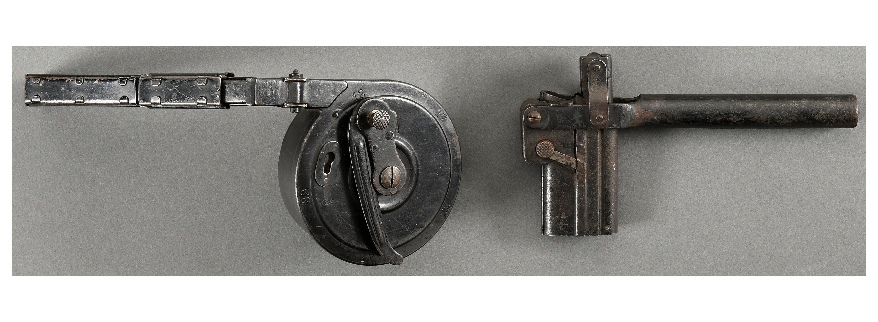 German Artillery Luger Snail Drum Magazine with Loading Tool | Rock Island Auction