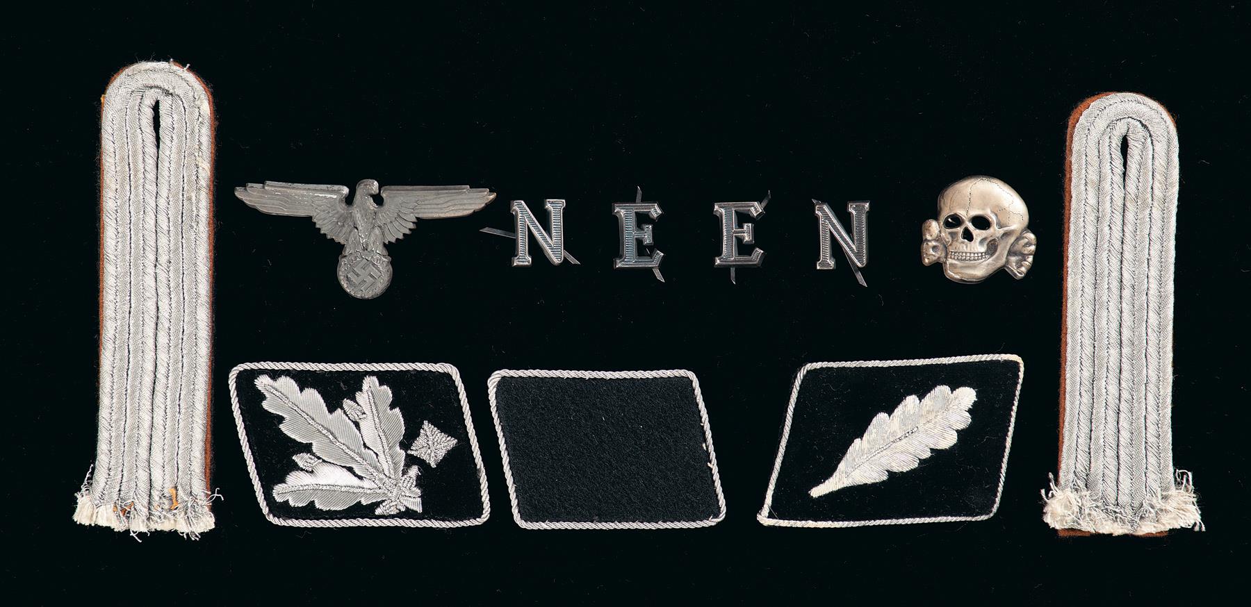 Group of SS Tabs, Badges and Shoulder Boards | Rock Island Auction