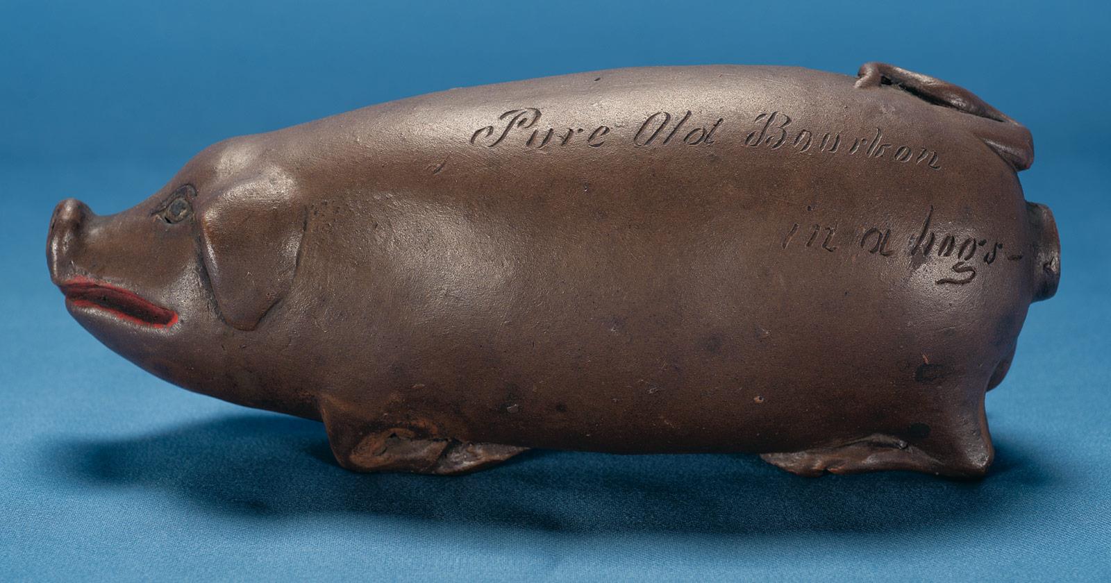 Early Anna Pottery Old Bourbon Hog flask | Rock Island Auction