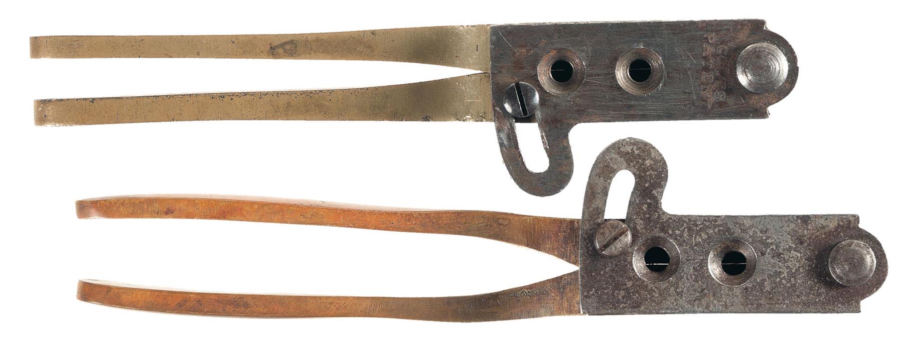 Two Colt Bullet Molds | Rock Island Auction